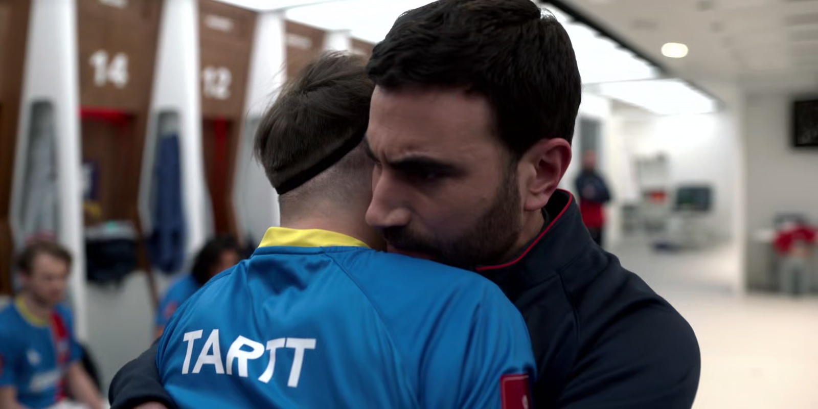 Ted Lasso - Image: (Roy hugs Jamie)